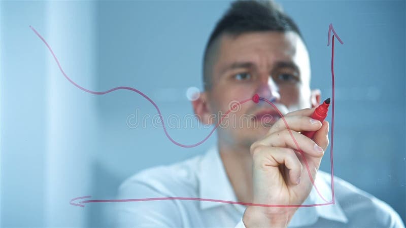 Businessman Drawing Trade Chart on Transparent Screen Stock Video ...