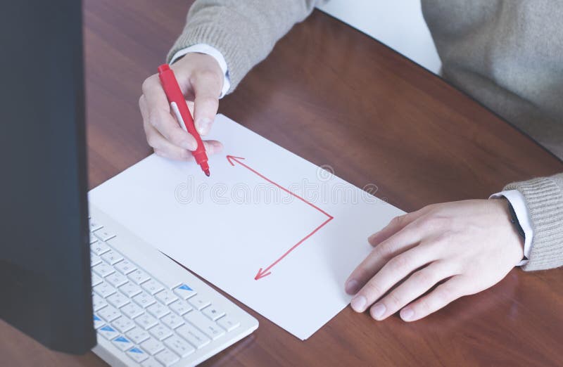 Businessman Draws a Graph on a Blank Sheet. Red Arrow Stock Image ...
