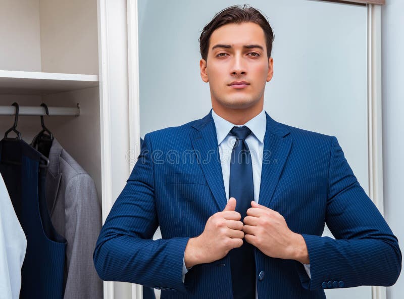 Businessman Dressing Up for Work Stock Image - Image of button ...