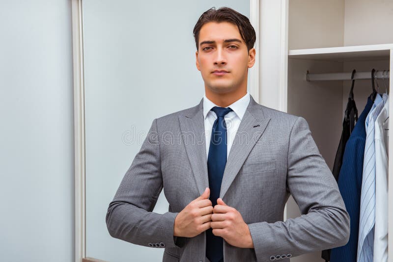 The Businessman Dressing Up for Work Stock Photo - Image of button ...