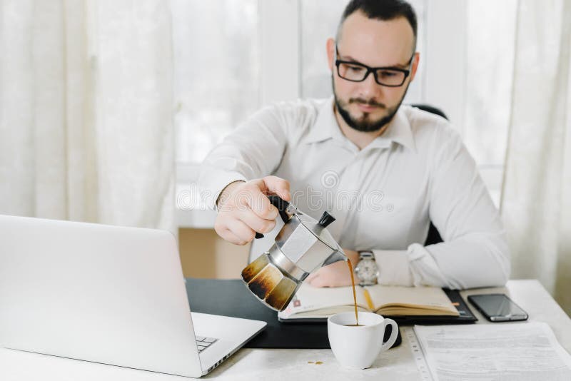 Businessman Drinking Coffee in the Workplace Stock Image - Image of ...