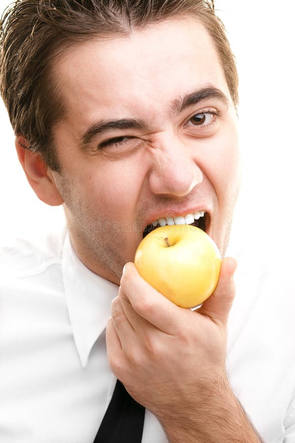 Businessman Eating Apple stock image. Image of portrait - 12227413