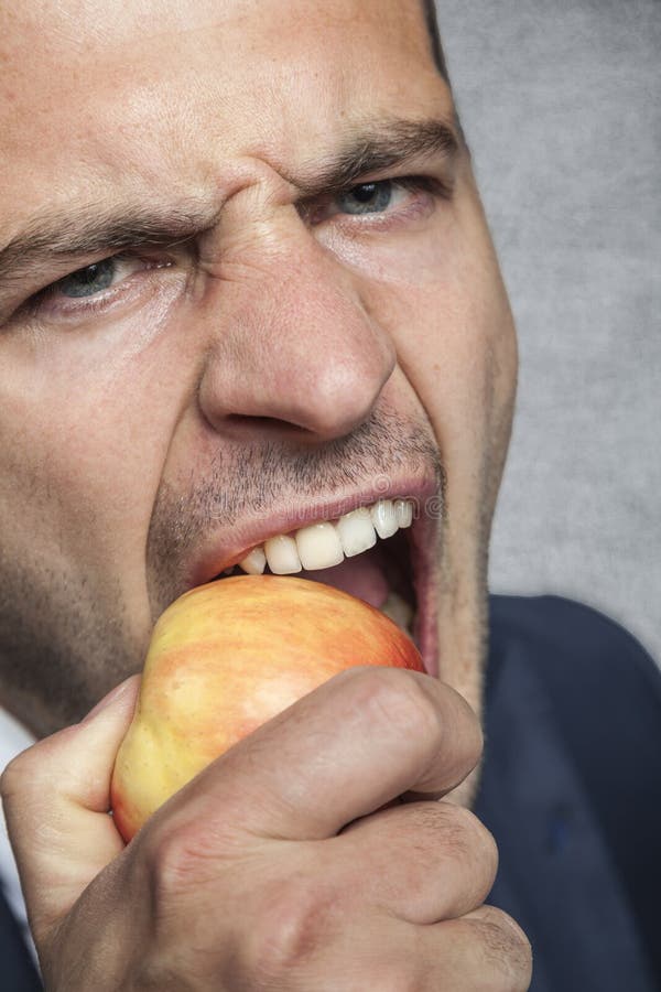Businessman Eating an Apple Stock Image - Image of health, industry ...