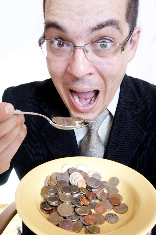 Businessman eating money stock image. Image of face, caucasian - 24031283
