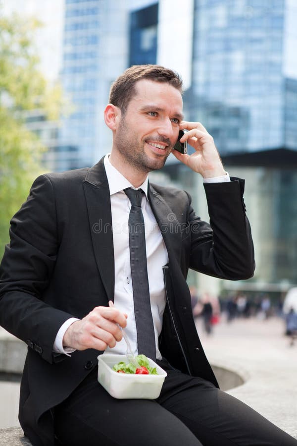 Businessman Eating Salad for Lunch Break Stock Image - Image of serious ...