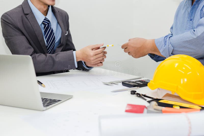 Businessman and Engineer Discuss at Meeting about Housing Project Stock ...