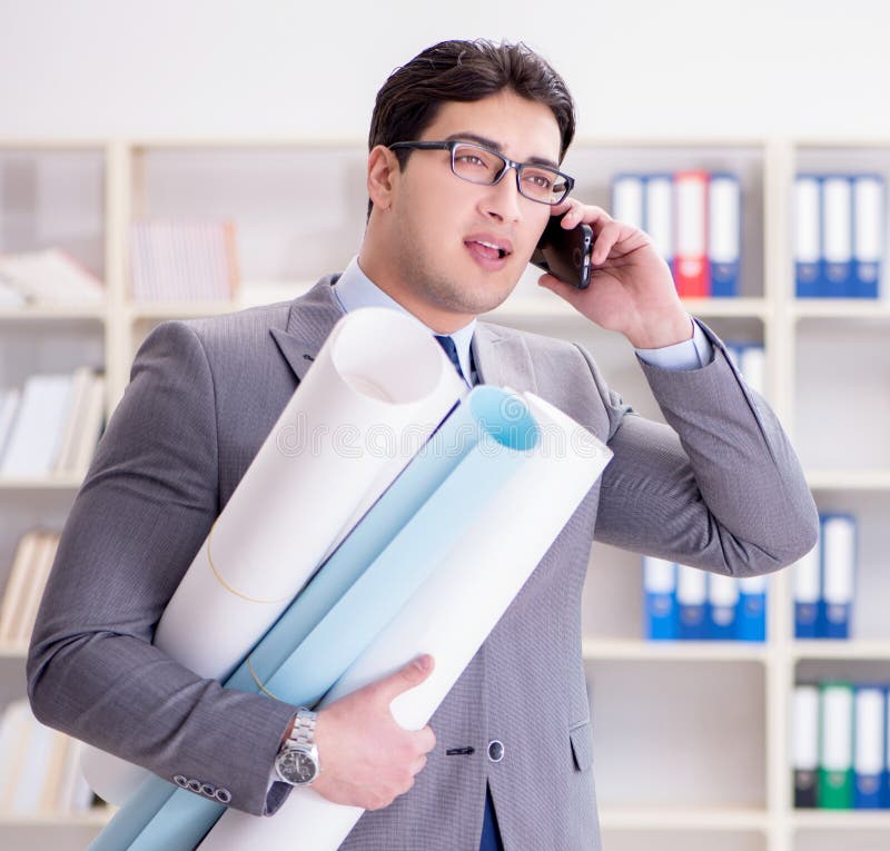 Businessman Engineer Draftsman with Blueprints Drawings Stock Photo ...