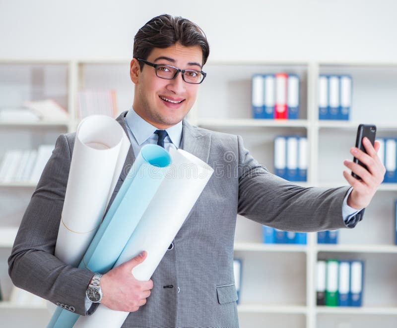 Businessman Engineer Draftsman with Blueprints Drawings Stock Photo ...