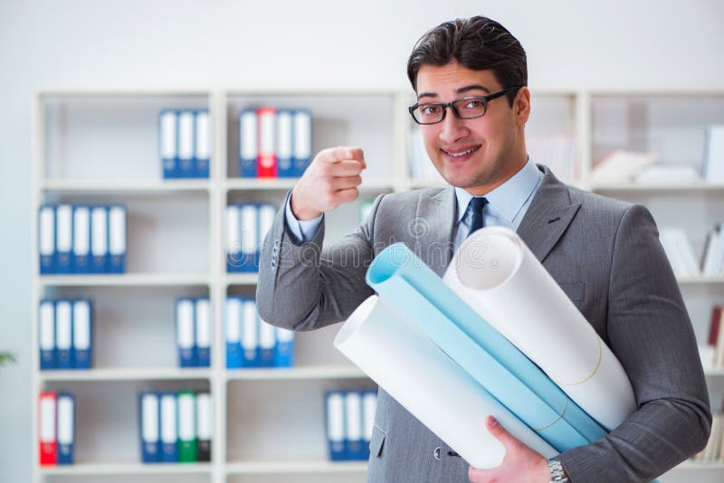 The Businessman Engineer Draftsman with Blueprints Drawings Stock Photo ...