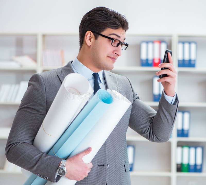 Businessman Engineer Draftsman with Blueprints Drawings Stock Photo ...