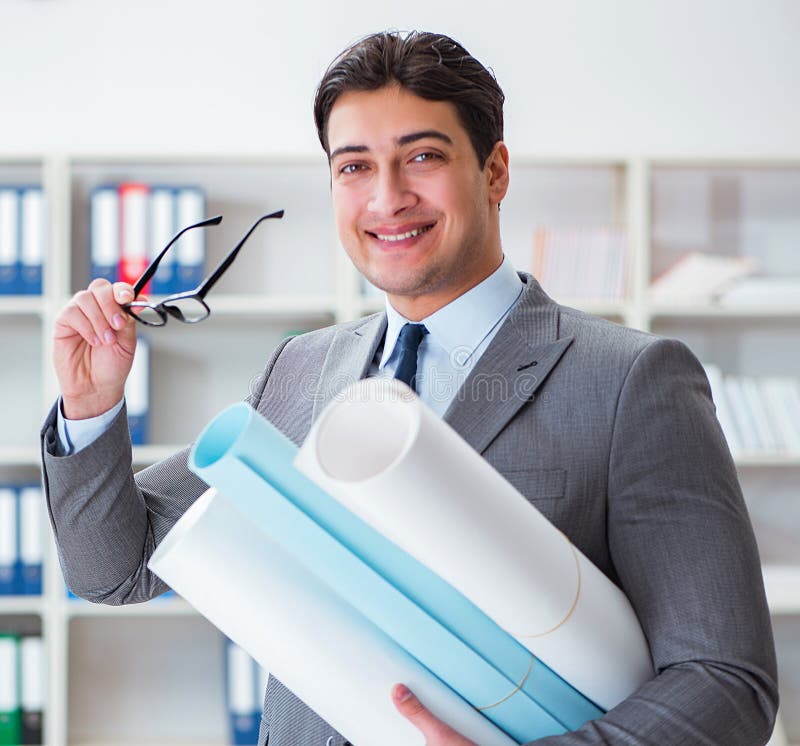 Businessman Engineer Draftsman with Blueprints Drawings Stock Photo ...