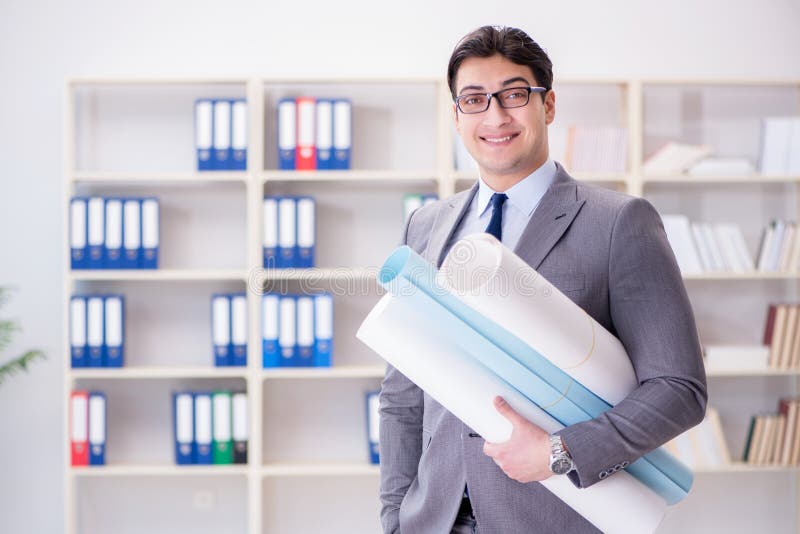 The Businessman Engineer Draftsman with Blueprints Drawings Stock Image ...