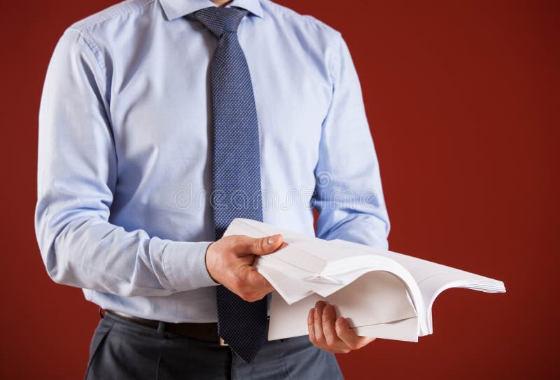 Businessman Examining Documents Stock Image - Image of concentration ...