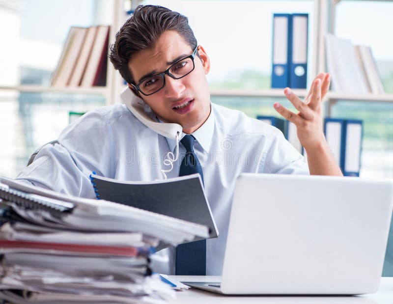 Businessman with Excessive Work Paperwork Working in Office Stock Photo ...