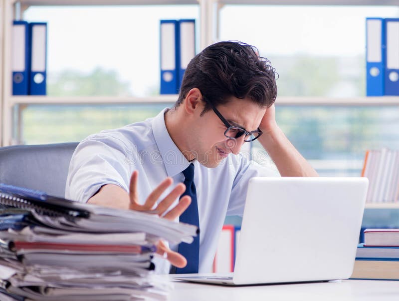Businessman with Excessive Work Paperwork Working in Office Stock Photo ...