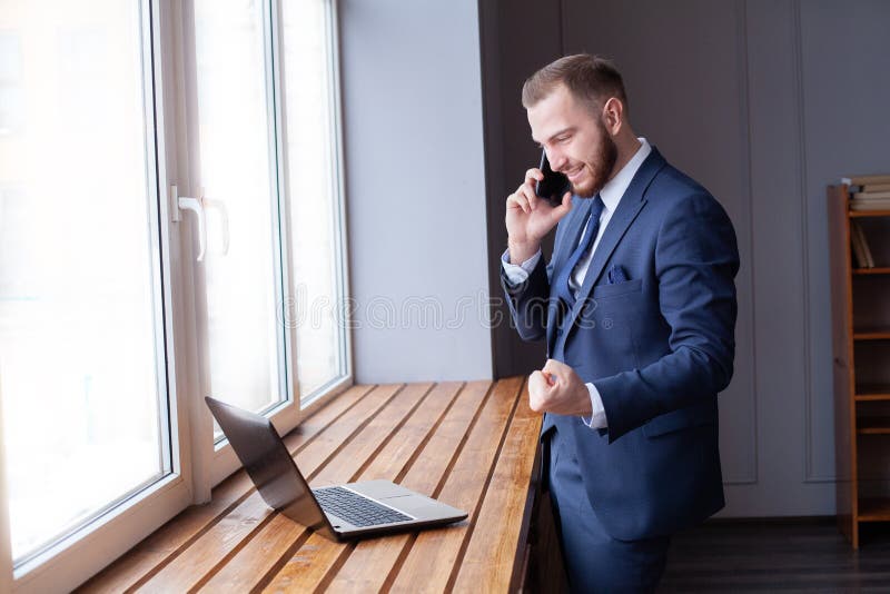 Businessman Executive Using Smartphone and Laptop Indoor Stock Photo ...