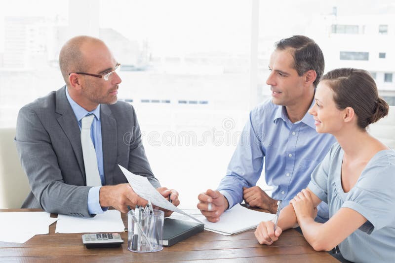 Businessman Explaining Contract To Business Partners Stock Image ...