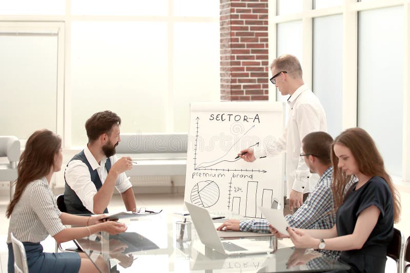 Businessman Explaining His Colleagues Ideas for the Development of a ...