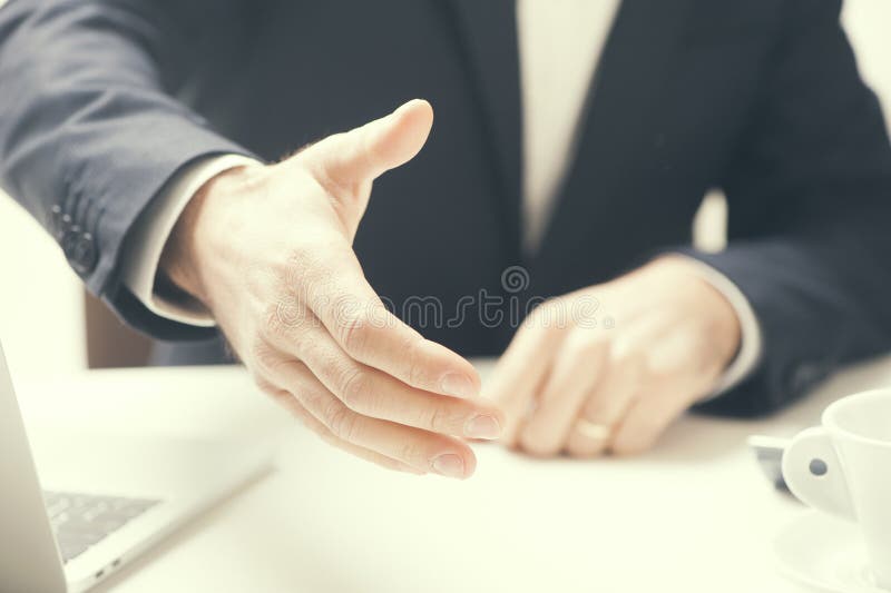 A Businessman is Extending His Hand Stock Photo - Image of suit ...