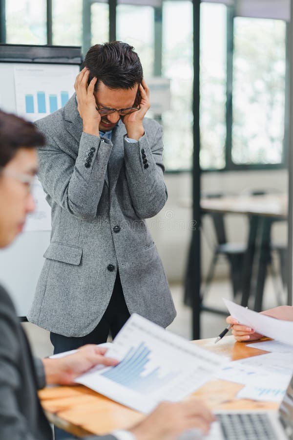 Businessman Feeling Stressed during a Presentation in an Office. Stock ...
