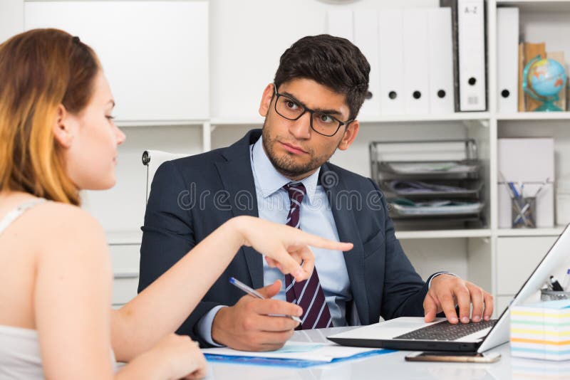 Businessman with Female Client Stock Image - Image of laptop, portrait ...