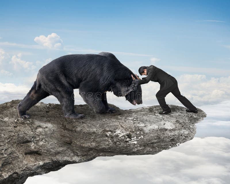 Businessman Fighting Against Black Bear on Cliff with Sky Clouds Stock ...
