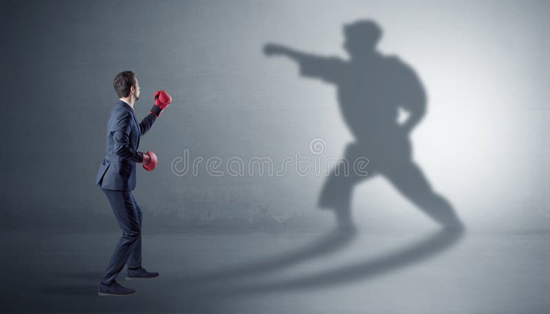 Young Businessman Fighting with His Shadow Stock Photo - Image of ...