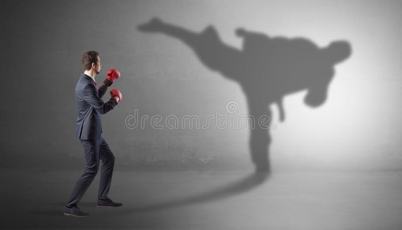 Young Businessman Fighting with His Shadow Stock Photo - Image of jump ...