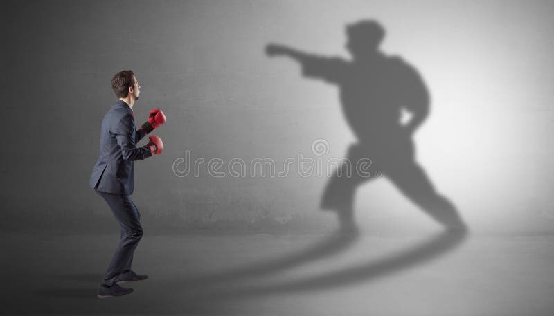 Young Businessman Fighting with His Shadow Stock Photo - Image of fight ...