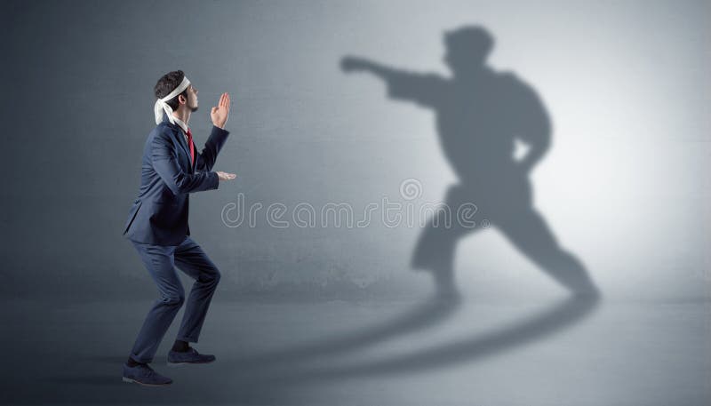 Young Businessman Fighting with His Shadow Stock Photo - Image of ...