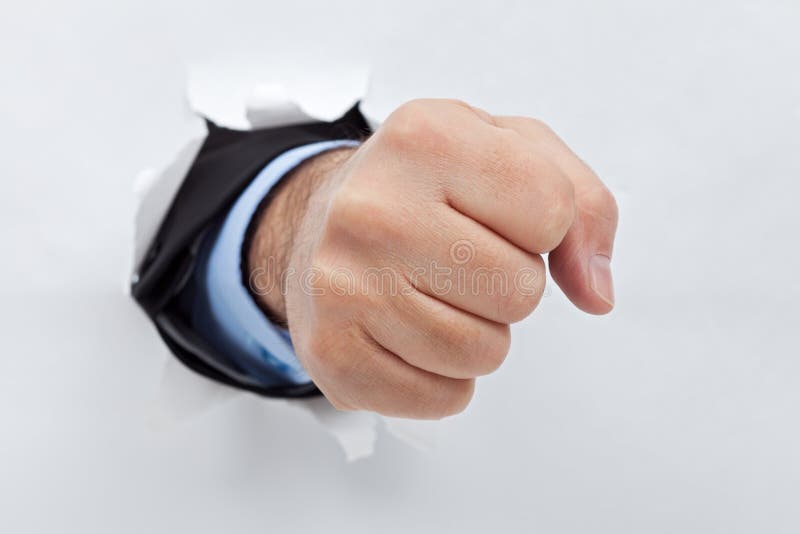 Businessman Fist through the Paper Stock Photo - Image of success ...