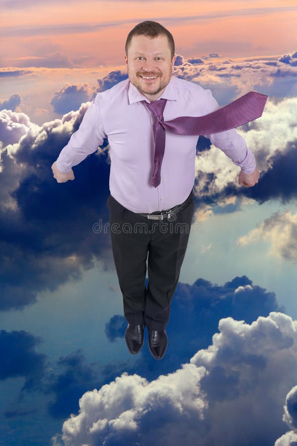 Businessman Flying Up Over Cloud Sky in Background Stock Photo - Image ...