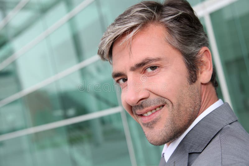 Businessman in Front of Office Building Stock Image - Image of modern ...