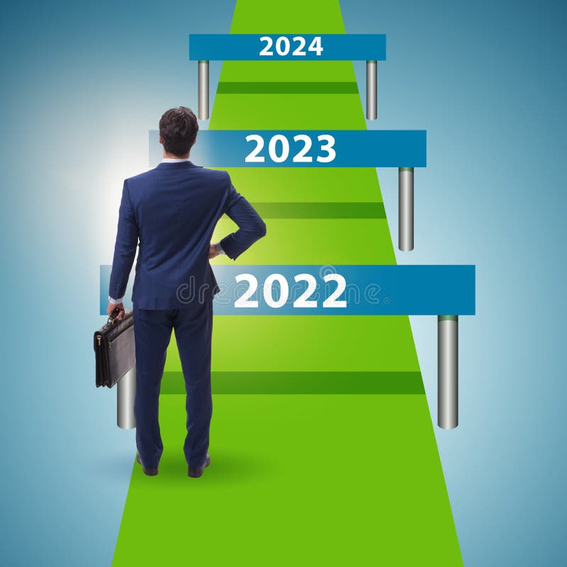 Businessman in Front of Year Barriers Stock Photo - Image of motivation ...