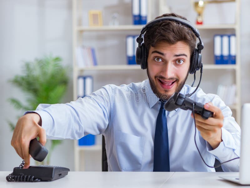 Businessman Gamer in Office Playing Games Stock Photo - Image of game ...