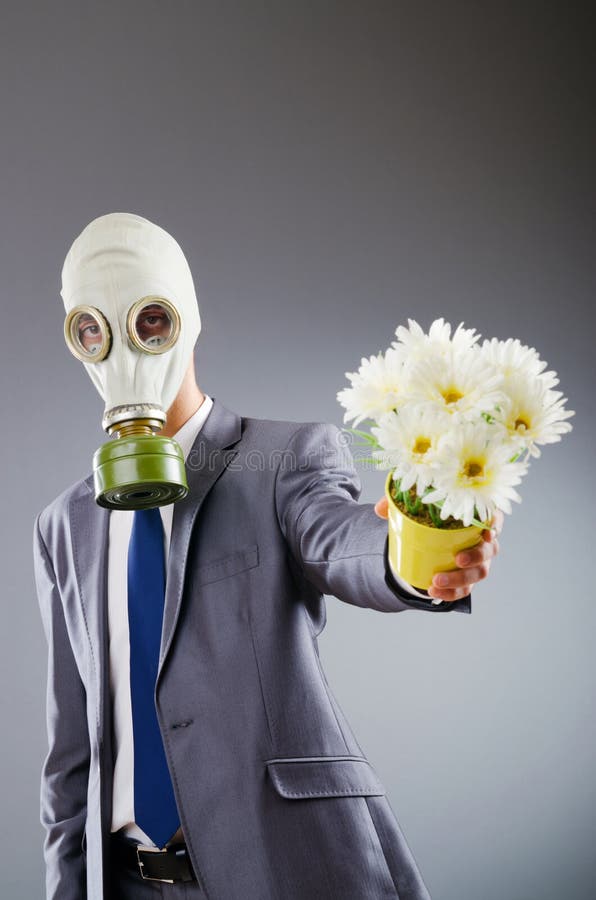 Businessman with Gas Mask and Flowers Stock Image - Image of green ...