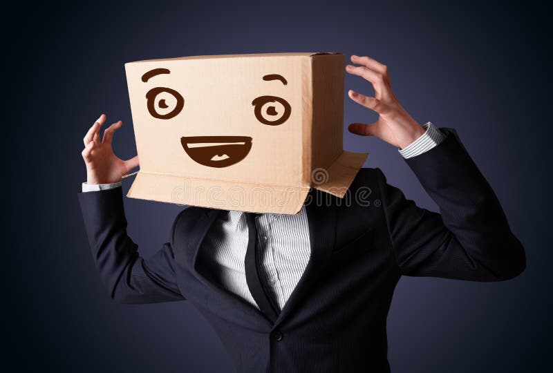 Businessman Gesturing with a Cardboard Box on His Head with Smiley Face ...