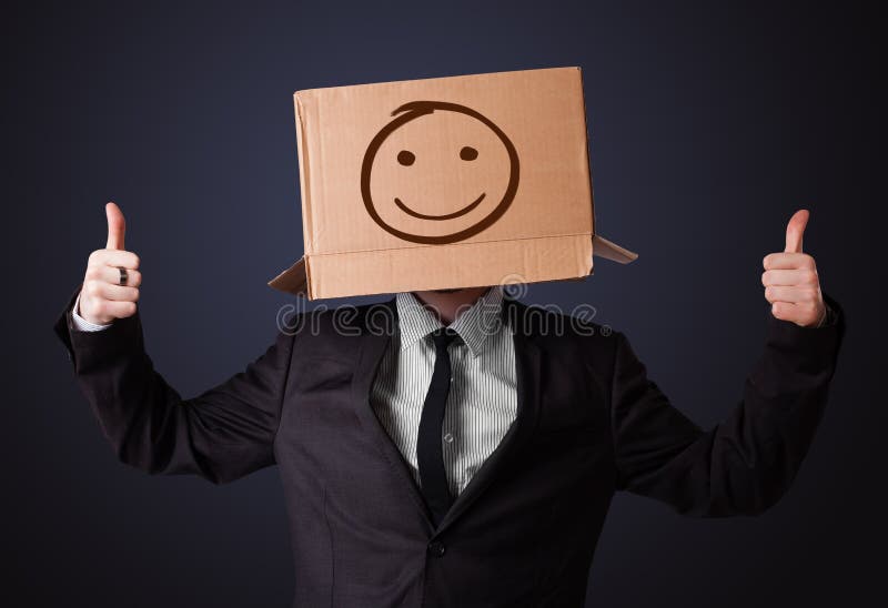 Businessman Gesturing with a Cardboard Box on His Head with Smiley Face ...
