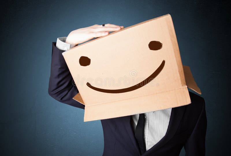 Businessman Gesturing with a Cardboard Box on His Head with Smiley Face ...