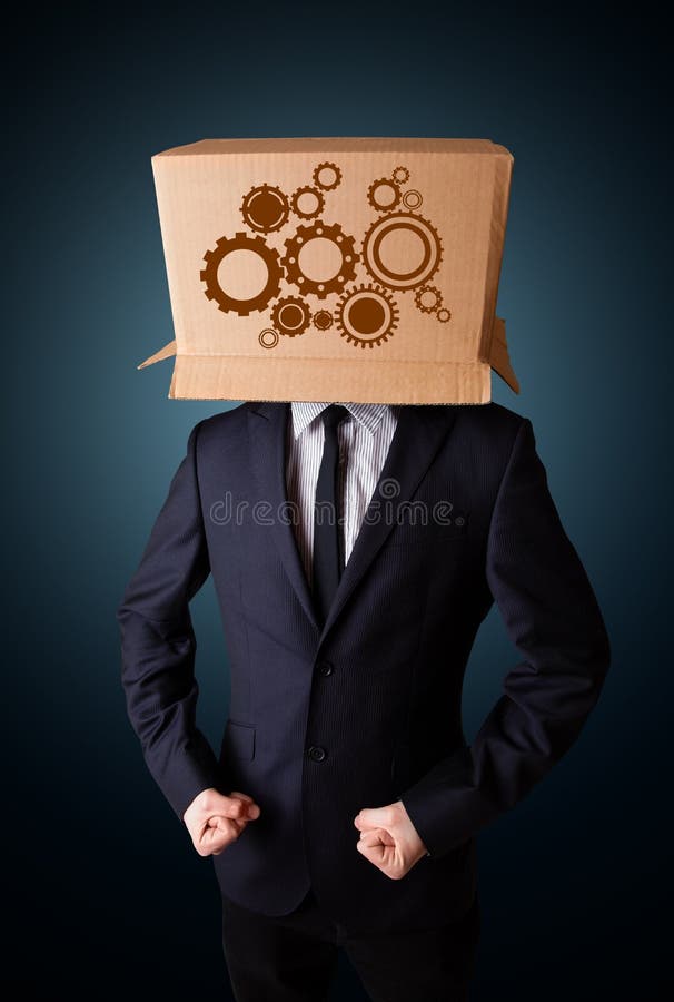 Businessman Gesturing with a Cardboard Box on His Head with Spur Stock ...