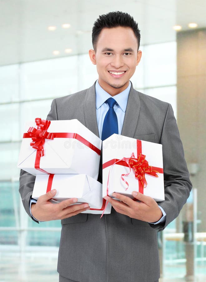 Businessman with Gift Boxes Stock Image - Image of delivery, business ...