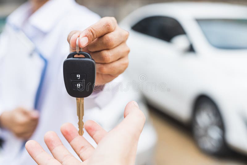 Businessman Giving a Car Key. Getting New Car Stock Image - Image of ...