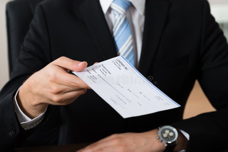 Businessman Giving Cheque stock photo. Image of giving - 57969116
