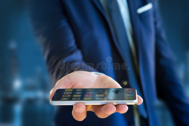 Businessman Giving an Empty Hand with Smartphone at the Office Stock ...