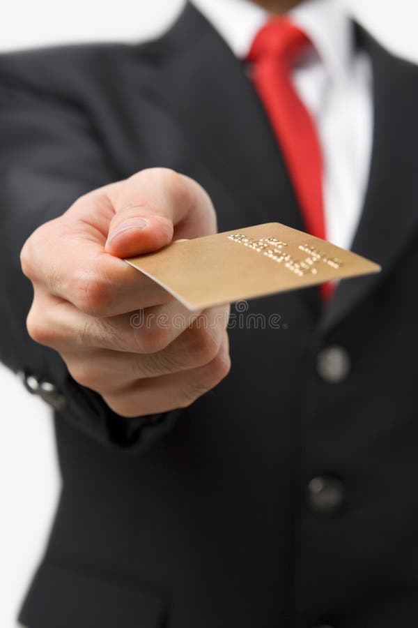 Businessman Giving Gold Credit Card Stock Image - Image of holding ...