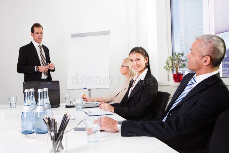 Business Man Giving Training To His Colleagues Stock Image - Image of ...