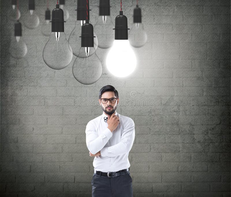 Businessman with Glowing Light Bulb Stock Photo - Image of eyeglasses ...