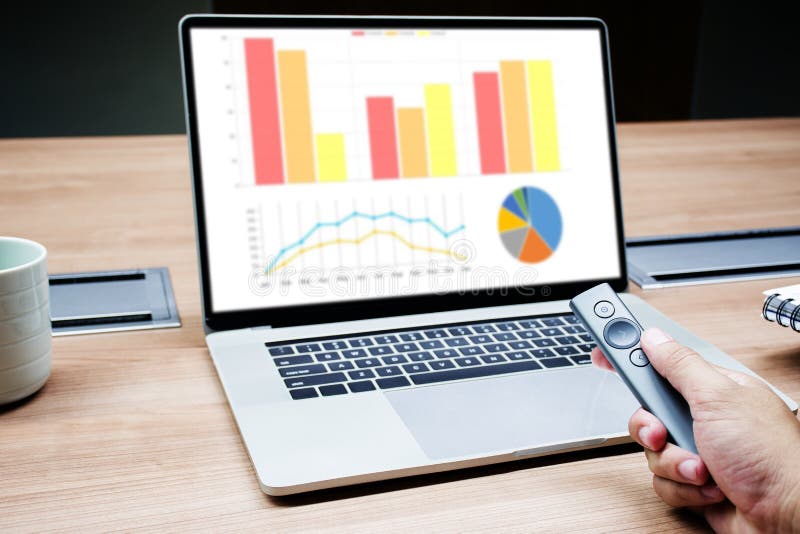 Businessman Hand Hold Remote Control Slide with Mock Up Chart Slide ...