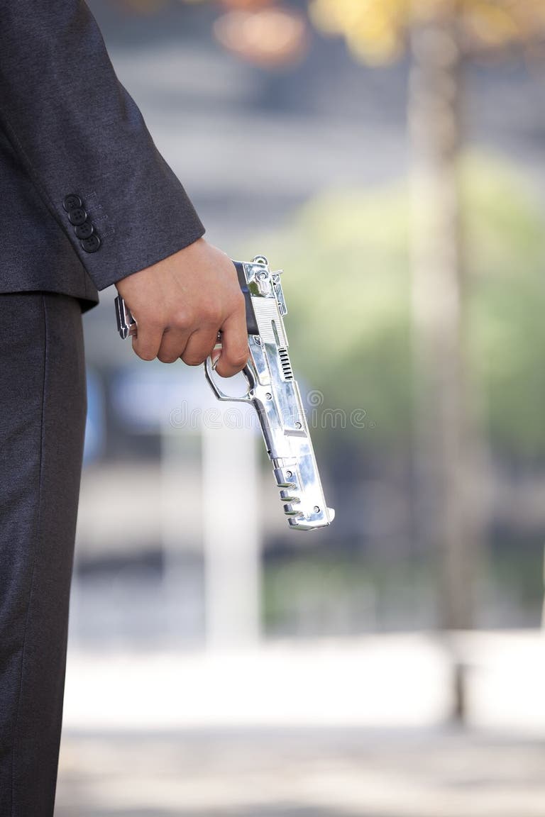 13,490 Hand Holding Gun Stock Photos - Free & Royalty-Free Stock Photos ...