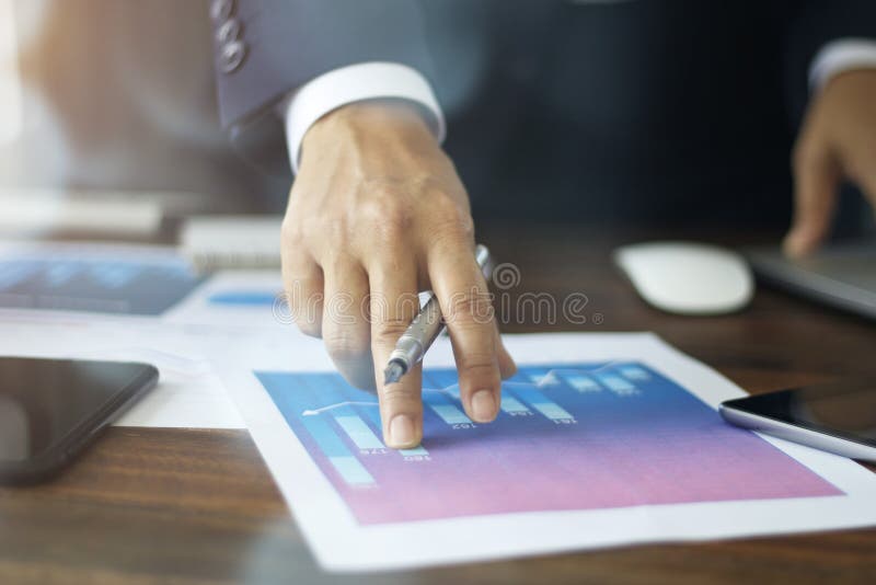 Businessman Hand Pointing at Graph Chart Growth Business Document Stock ... Businessman Hand Pointing at Graph Chart Growth Business Document Stock ...